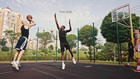 Three-point shot. A young basketball pla... | Stock Video | Pond5