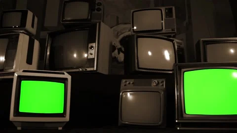 Three Retro TVs Green Screen over a Pile... | Stock Video | Pond5