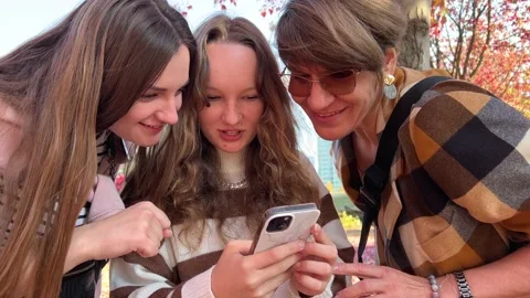 Three women of different ages look at th... | Stock Video | Pond5