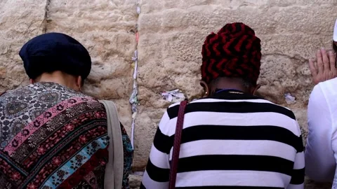 Three women standing and praying on West... | Stock Video | Pond5