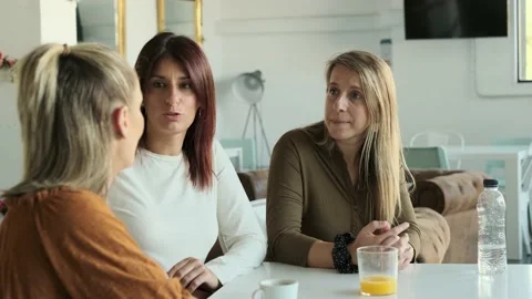 Three women talking while sitting in a c... | Stock Video | Pond5