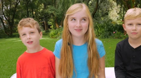 Three young children roll their eyes and... | Stock Video | Pond5
