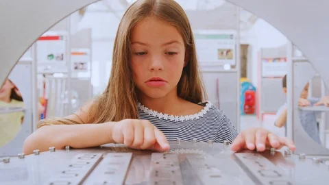 Three young kids do practical experiment... | Stock Video | Pond5