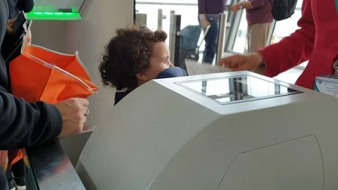 Ticket flight scanner at the airport gat... | Stock Video | Pond5