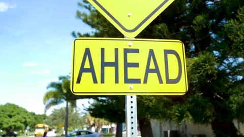 Tilt up on a caution playground ahead si... | Stock Video | Pond5