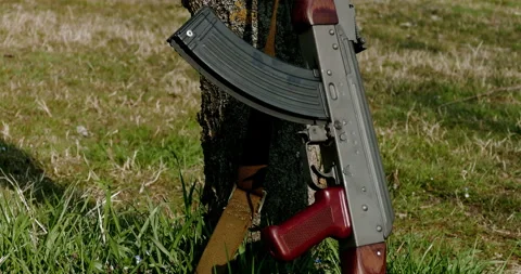 Tilt up close-up view of an AK-47 Kalash... | Stock Video | Pond5