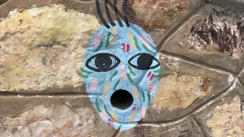 Tilt down shot funny scary face drawing ... | Stock Video | Pond5