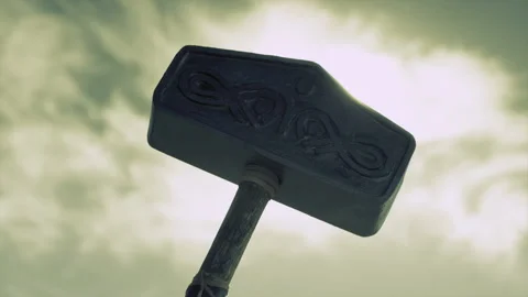 Tilt down shot of Thor holding his Mjoln... | Stock Video | Pond5