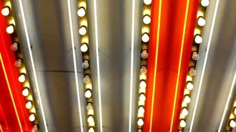 Tilt of Flashing Neon lights | Stock Video | Pond5