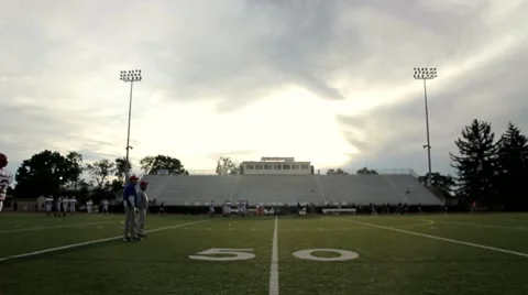 Tilt of Football Stadium at the 50 Yard ... | Stock Video | Pond5