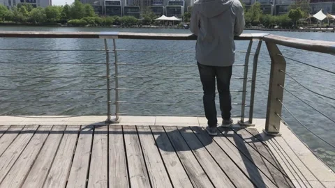 Man Standing Idle Stock Footage ~ Royalty Free Stock Videos | Pond5