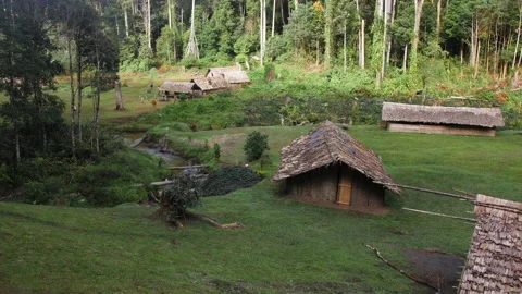 Tilt reveal shot of Deniki Village on Ko... | Stock Video | Pond5