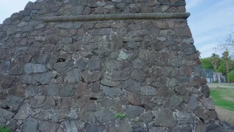 Tilt up of the ruins of a colonial wall ... | Stock Video | Pond5