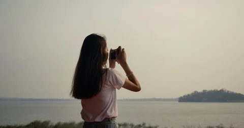 Tilt Shot, Traveler young asian woman ta... | Stock Video | Pond5