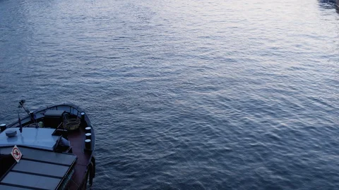 Tilted top down view of a ship sailing b... | Stock Video | Pond5