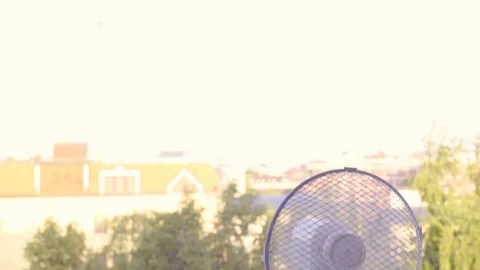 Tilting on to fan blowing wind inside fr... | Stock Video | Pond5