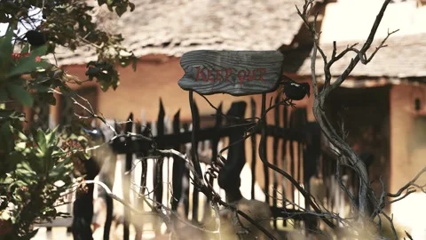 A Tim Burton-style house 'Keep Out' sign | Stock Video | Pond5