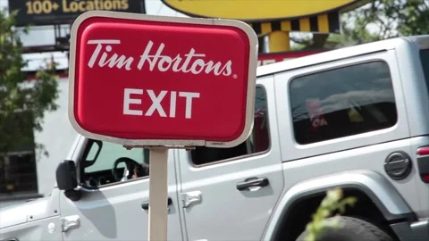 tim hortons exit enter drive thru signs ... | Stock Video | Pond5