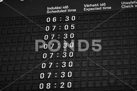 Time boards at the airport. Flight information mechanical timetable ...