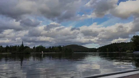 Time lapse at the border of a lake in ca... | Stock Video | Pond5