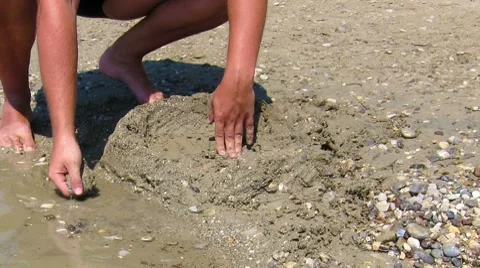 Time-lapse: building of sand castle on C... | Stock Video | Pond5