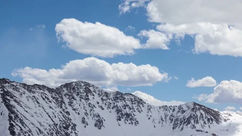 Time Lapse of clouds above the Rocky Mou... | Stock Video | Pond5