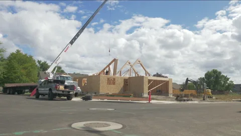 Time-Lapse of Crane Moving Roof Beam Int... | Stock Video | Pond5