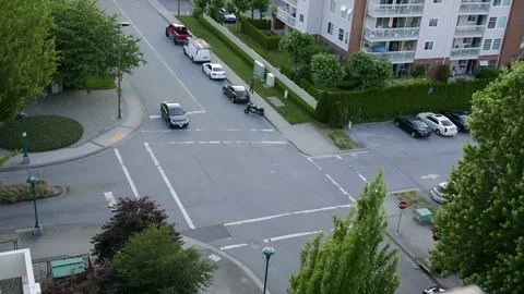 Time lapse of four way traffic intersect... | Stock Video | Pond5