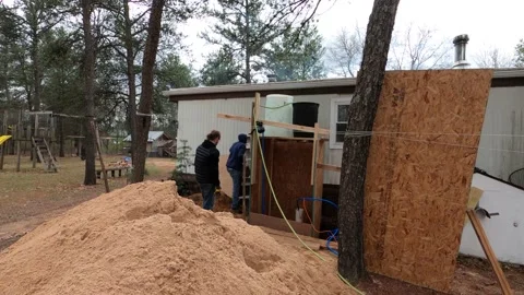 Time lapse of men trying to lower box of... | Stock Video | Pond5