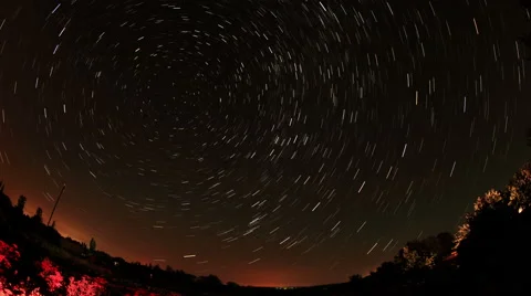 Time lapse of the night sky with clouds ... | Stock Video | Pond5