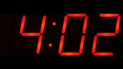 Time showing between 04:00 and 04:59 on ... | Stock Video | Pond5