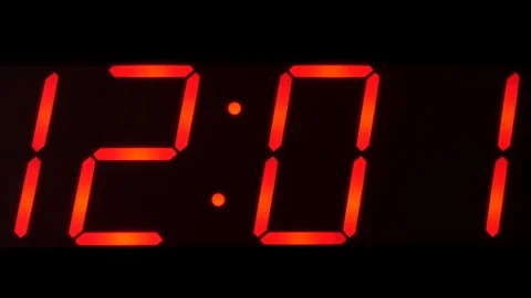Time showing between 1200 and 1259 on bi... | Stock Video | Pond5