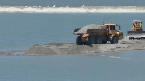 TIMELAPSE Dumper Truck dumping dirt sand... | Stock Video | Pond5