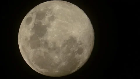 Timelapse of a full moon slowly rising i... | Stock Video | Pond5
