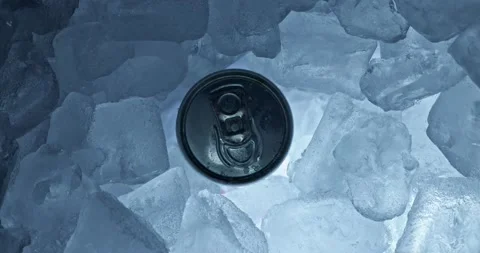 Tin can in ice rotating top view closeup... | Stock Video | Pond5