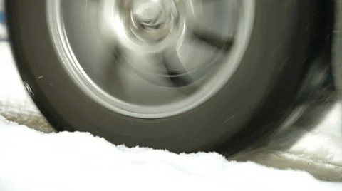 Tires Slipping In Snow Stock Footage ~ Royalty Free Stock Videos | Pond5