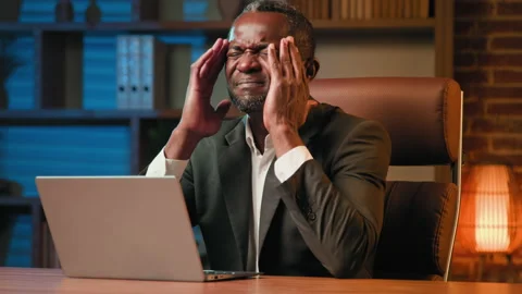 Tired african american man typing on lap... | Stock Video | Pond5