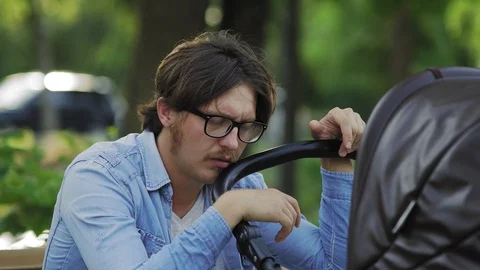 Tired father falling asleep during relax... | Stock Video | Pond5