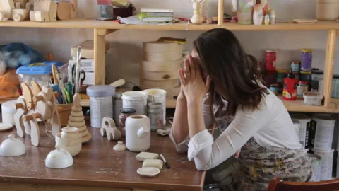 a tired female artist is resting in the ... | Stock Video | Pond5