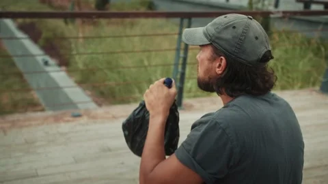 Tired homeless man, refugee tourist on a... | Stock Video | Pond5