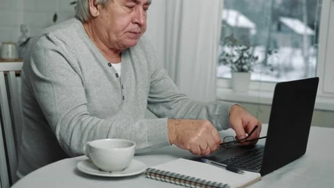 Tired Stressed Old Man Rests His Eyes Us... | Stock Video | Pond5