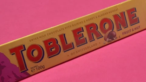 Toblerone Swiss chocolate bar with nuts.... | Stock Video | Pond5