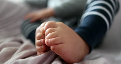 Toddler boy touchign toes. one year old ... | Stock Video | Pond5