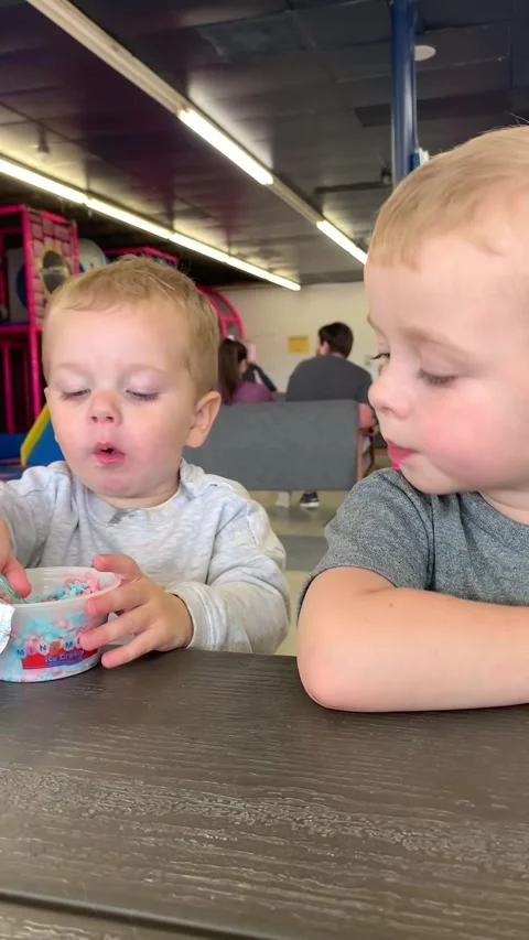 Toddler Makes Two-Bite Rule When Sharing... | Stock Video | Pond5