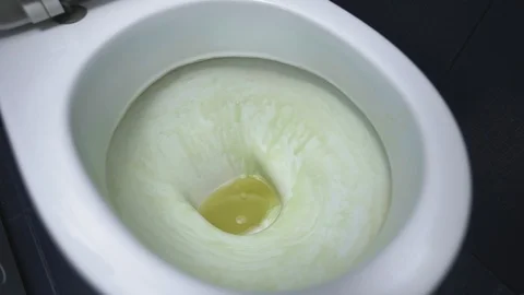 Toilet bowl with running water. Flush cl... | Stock Video | Pond5