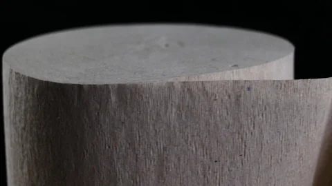Toilet paper roll rotating on black back... | Stock Video | Pond5