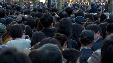 TOKYO, JAPAN : Huge crowd of people walk... | Stock Video | Pond5