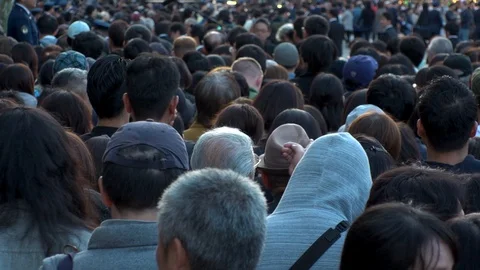 TOKYO, JAPAN : Huge crowd of people walk... | Stock Video | Pond5