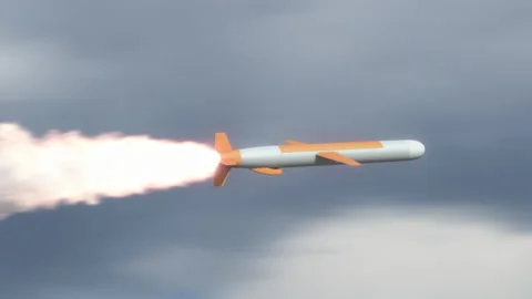 Tomahawk cruise missile flying in the cl... | Stock Video | Pond5
