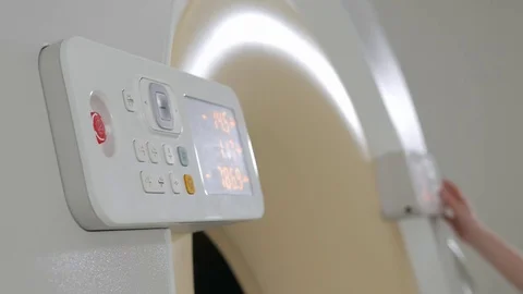 Tomography. Doctor hand adjusts MRI | Stock Video | Pond5